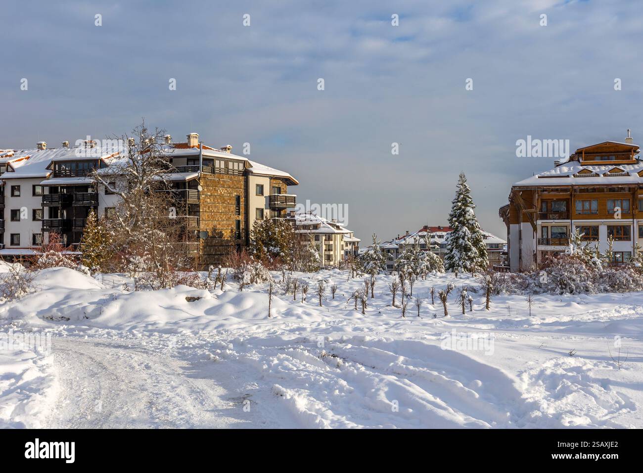 Bansko, Bulgaria winter street view, houses and Pirin snow mountain in ...