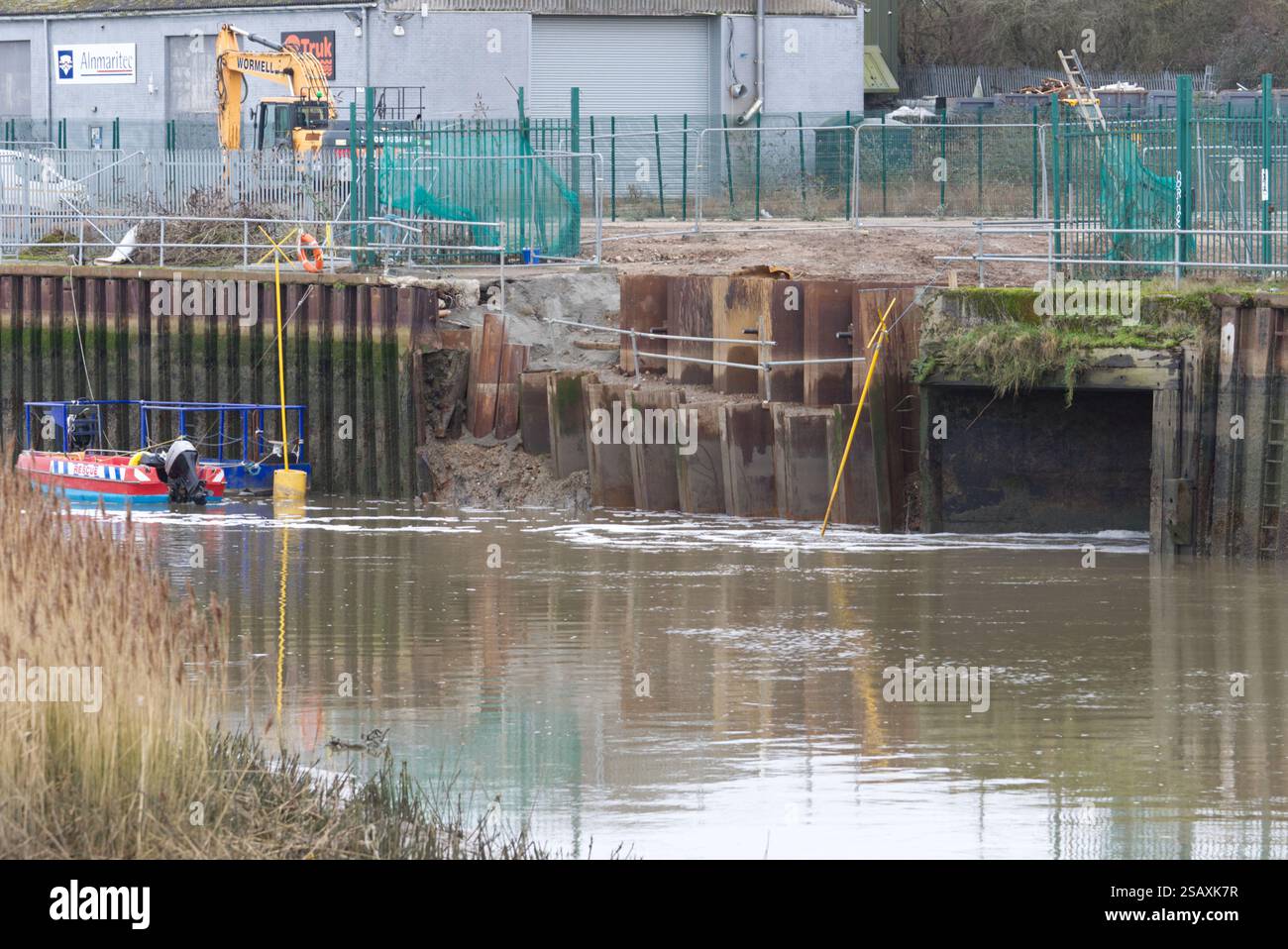 Ongoing repair work being carried out at Fieldgate Quay on the bank of ...