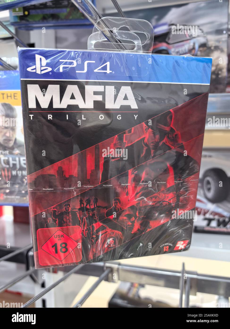 Bobruisk, Belarus - 26 January 2025: A striking retail display features the Mafia Trilogy game ...