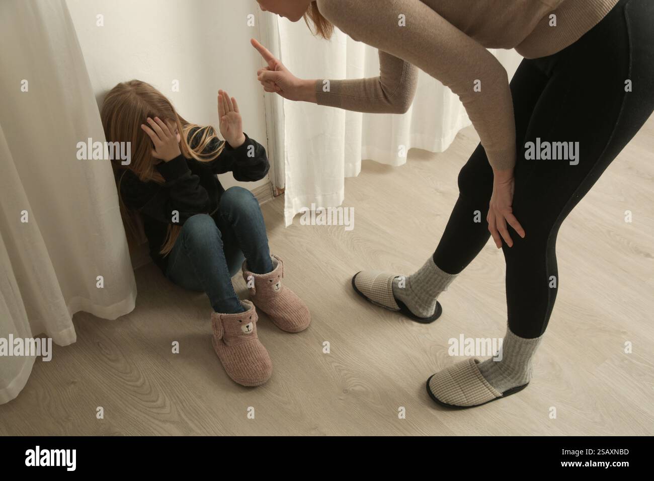The bullying parent. Angry mother threatening and yelling to child ...