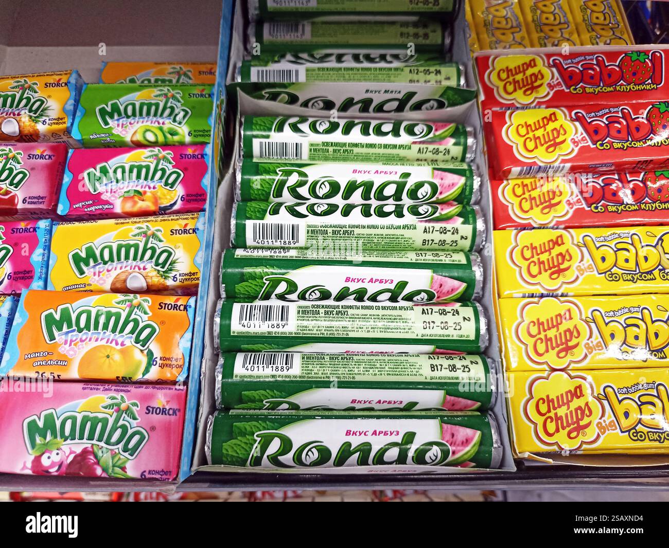 Assorted chewy and hard candy display in supermarket Stock Photo - Alamy