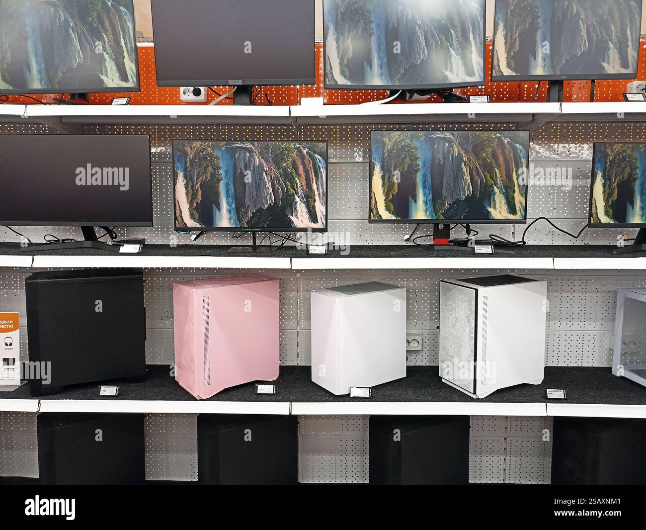 Computer store display with monitors and pc cases on shelves Stock ...