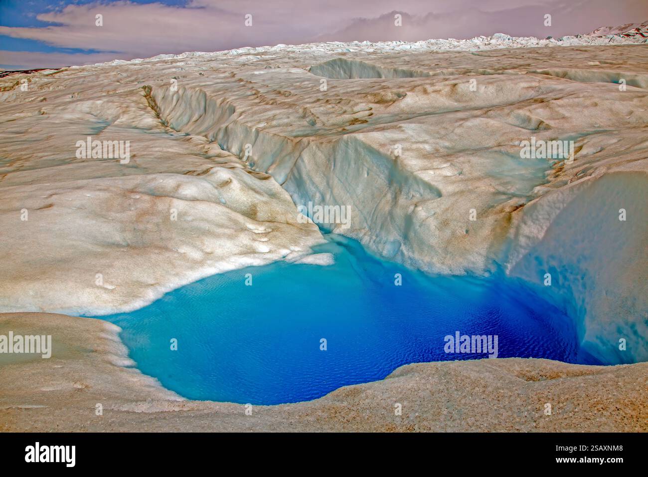 A vibrant meltwater lake on the surface of Grey Glacier in Patagonia ...