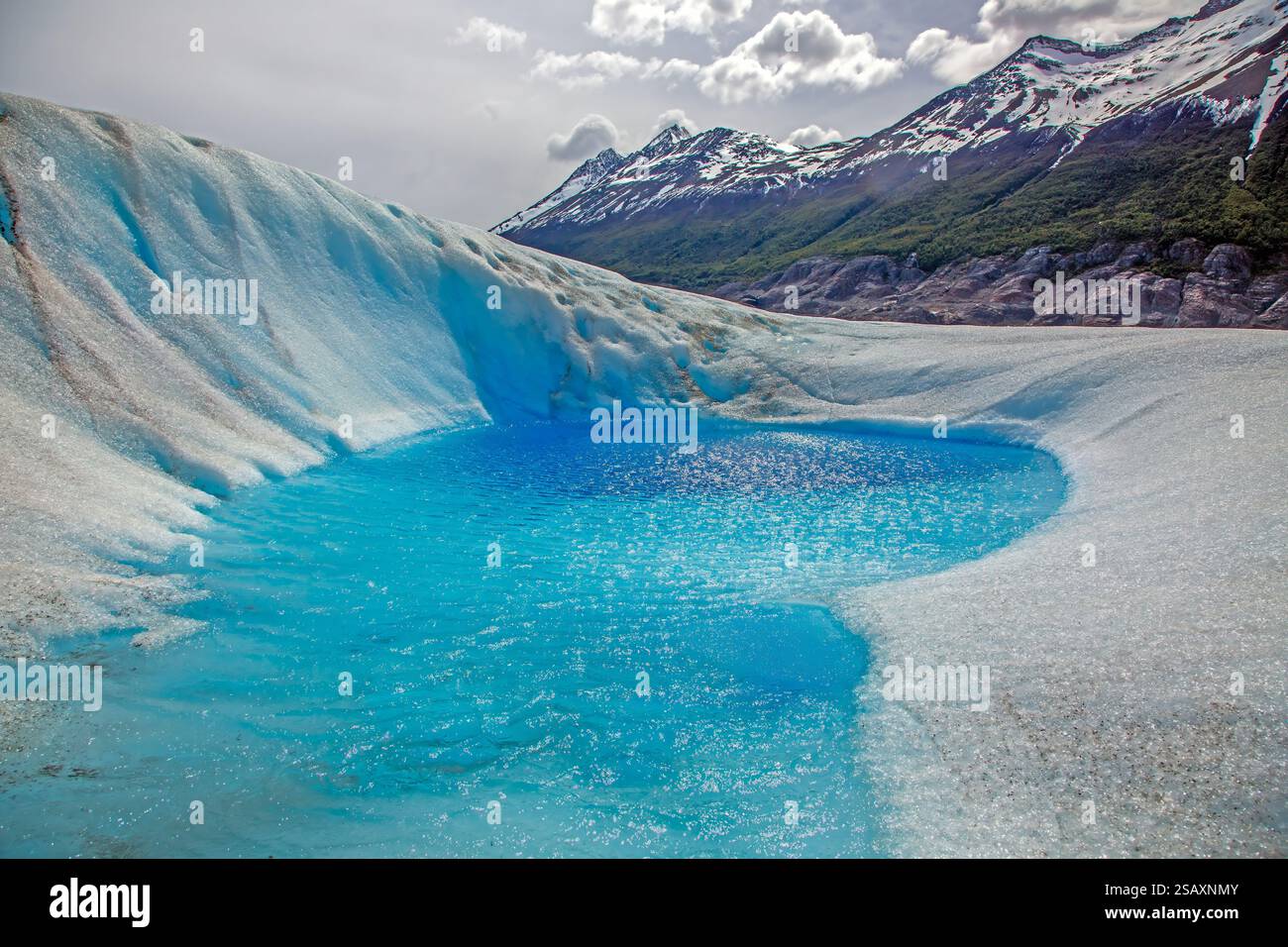 A vibrant meltwater lake on the surface of Grey Glacier in Patagonia ...