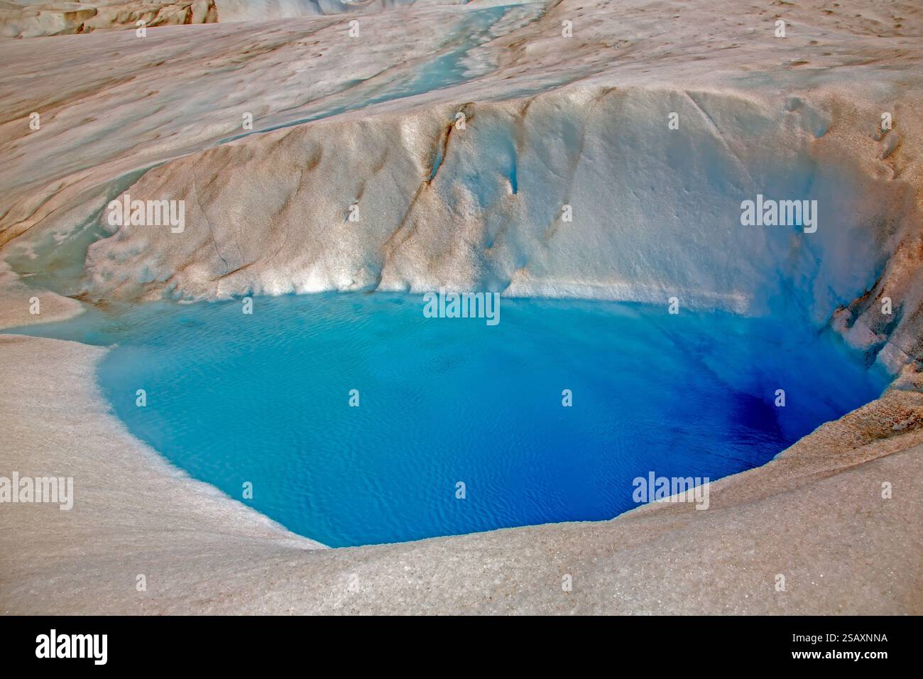 A vibrant meltwater lake on the surface of Grey Glacier in Patagonia ...