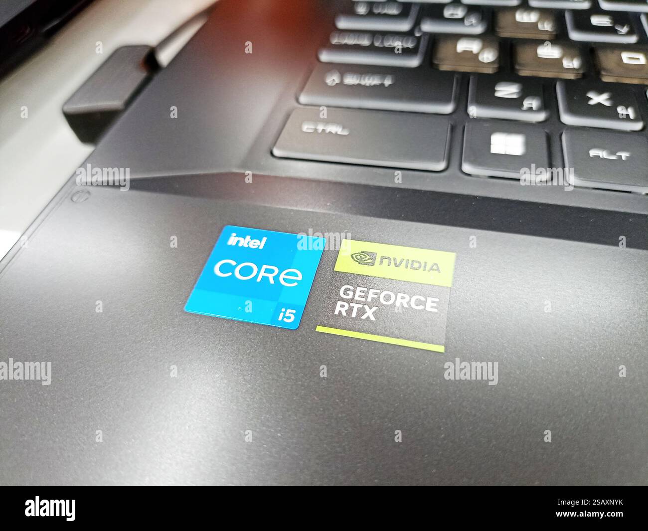 Laptop keyboard with intel core i5 and nvidia geforce rtx stickers ...