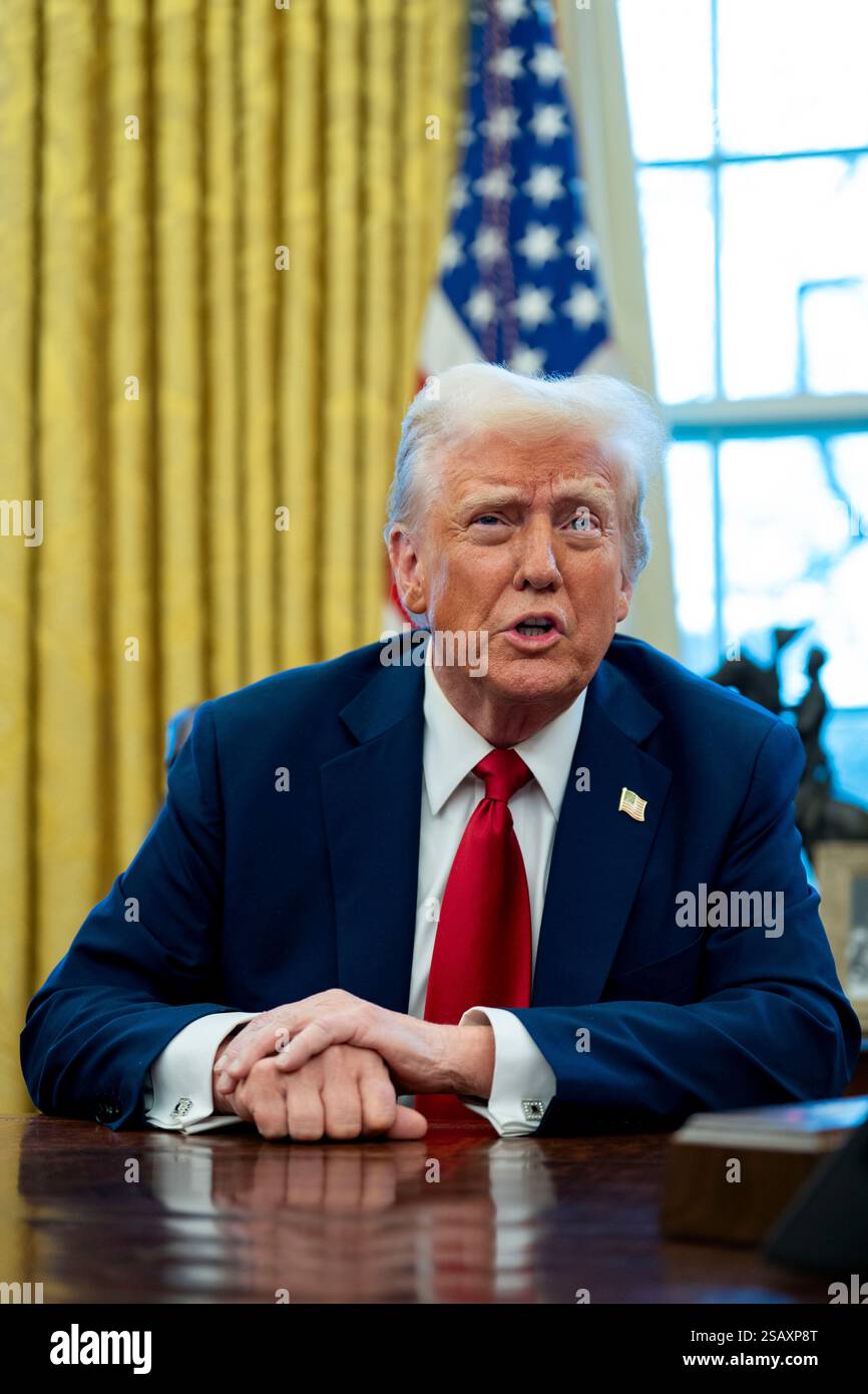 United States President Donald Trump signs two executive orders in the ...