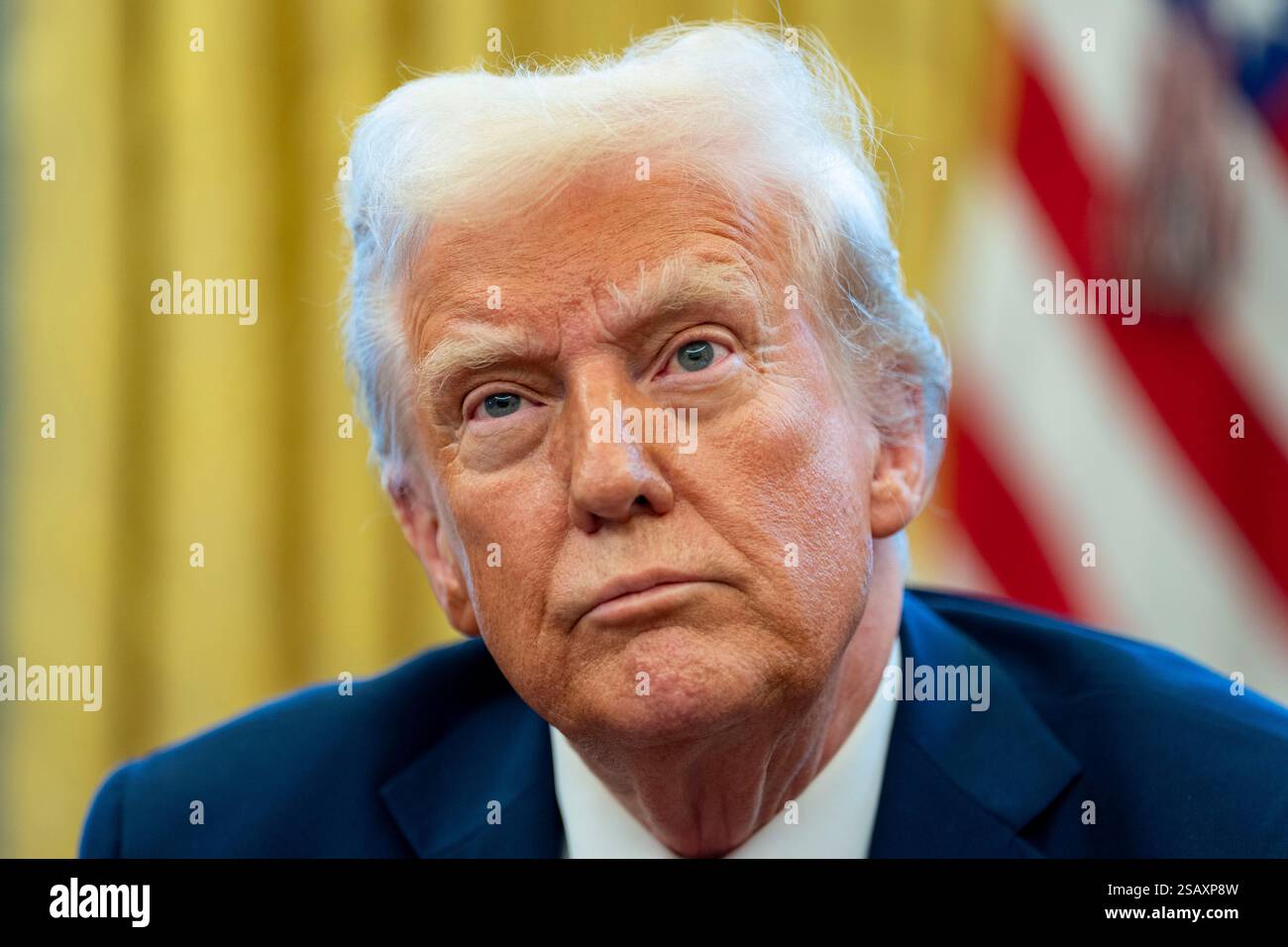 United States President Donald Trump signs two executive orders in the ...