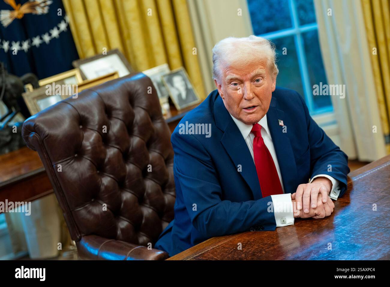 United States President Donald Trump signs two executive orders in the ...