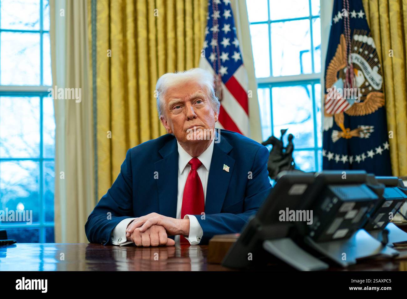 United States President Donald Trump signs two executive orders in the ...