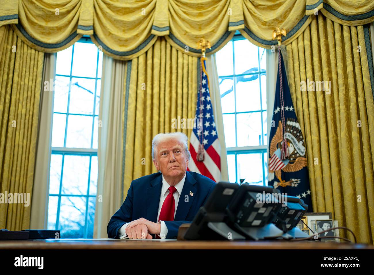 United States President Donald Trump signs two executive orders in the ...