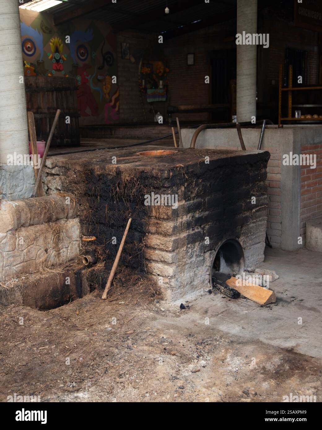 Mezcal is fermented and distilled in copper still tanks in artisanal ...