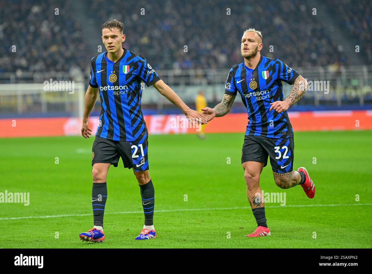 Milano, Italy. 29th, January 2025. Federico Dimarco (32) and Kristjan Asllani (21) of Inter seen ...