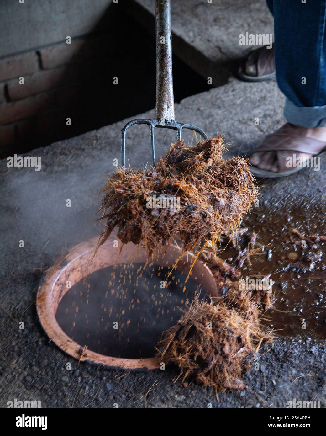 Mezcal is fermented and distilled in copper still tanks in artisanal ...