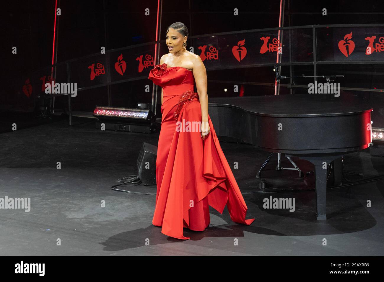 Sanaa Latha wearing dress by Rubin Singer walks on stage during ...