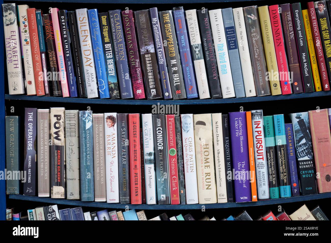 The weight of unsold books have bowed the shelves outside a branch of ...