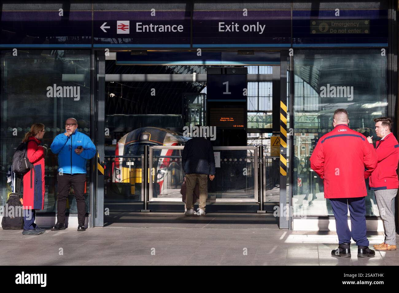 LNER staff are seen outside King's Cross mainline station, on 30th ...