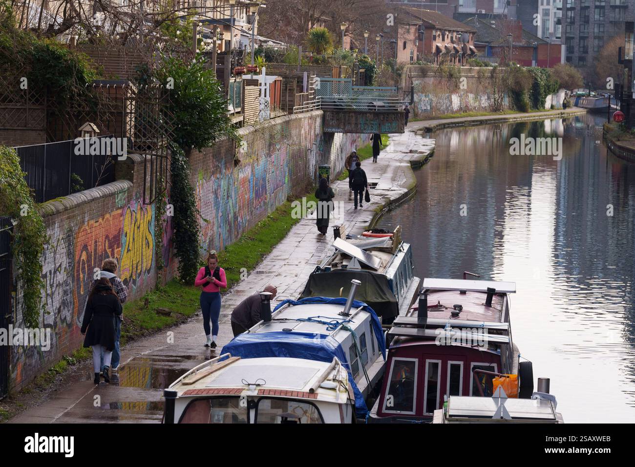 Members of the public walk the towpath at the Constitution Pub on ...