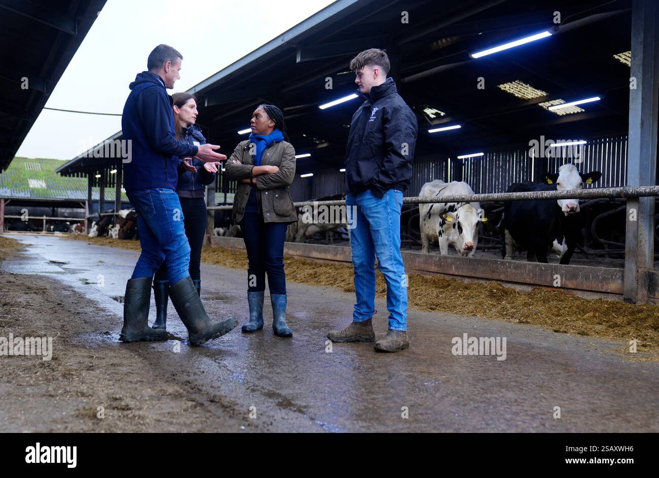 Conservative Party leader Kemi Badenoch speaking to farmer Richard ...