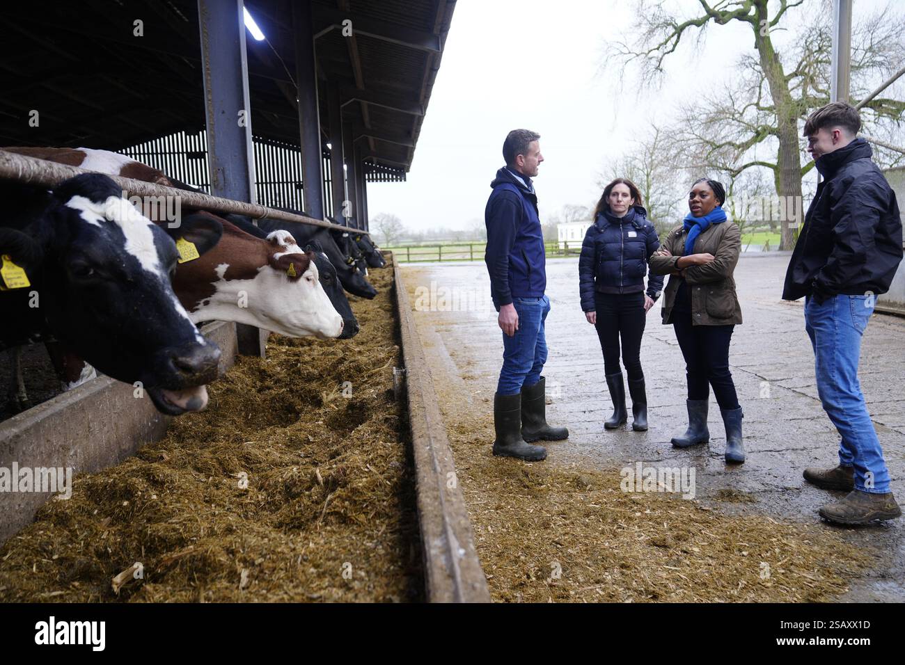 Conservative Party leader Kemi Badenoch speaking to farmer Richard ...