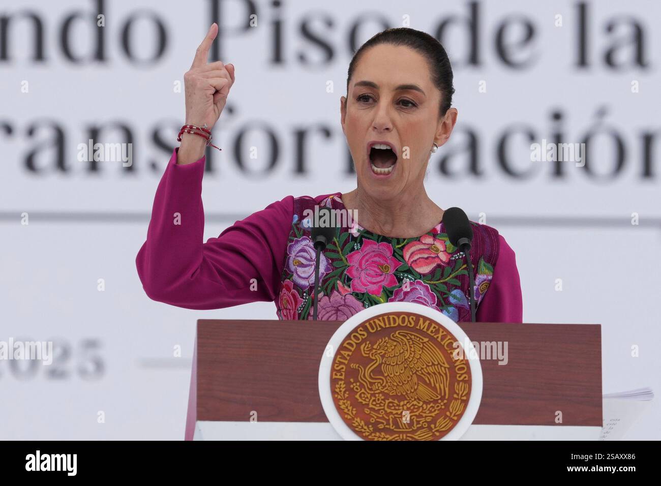 FILE - President Claudia Sheinbaum speaks to the crowd during an event ...