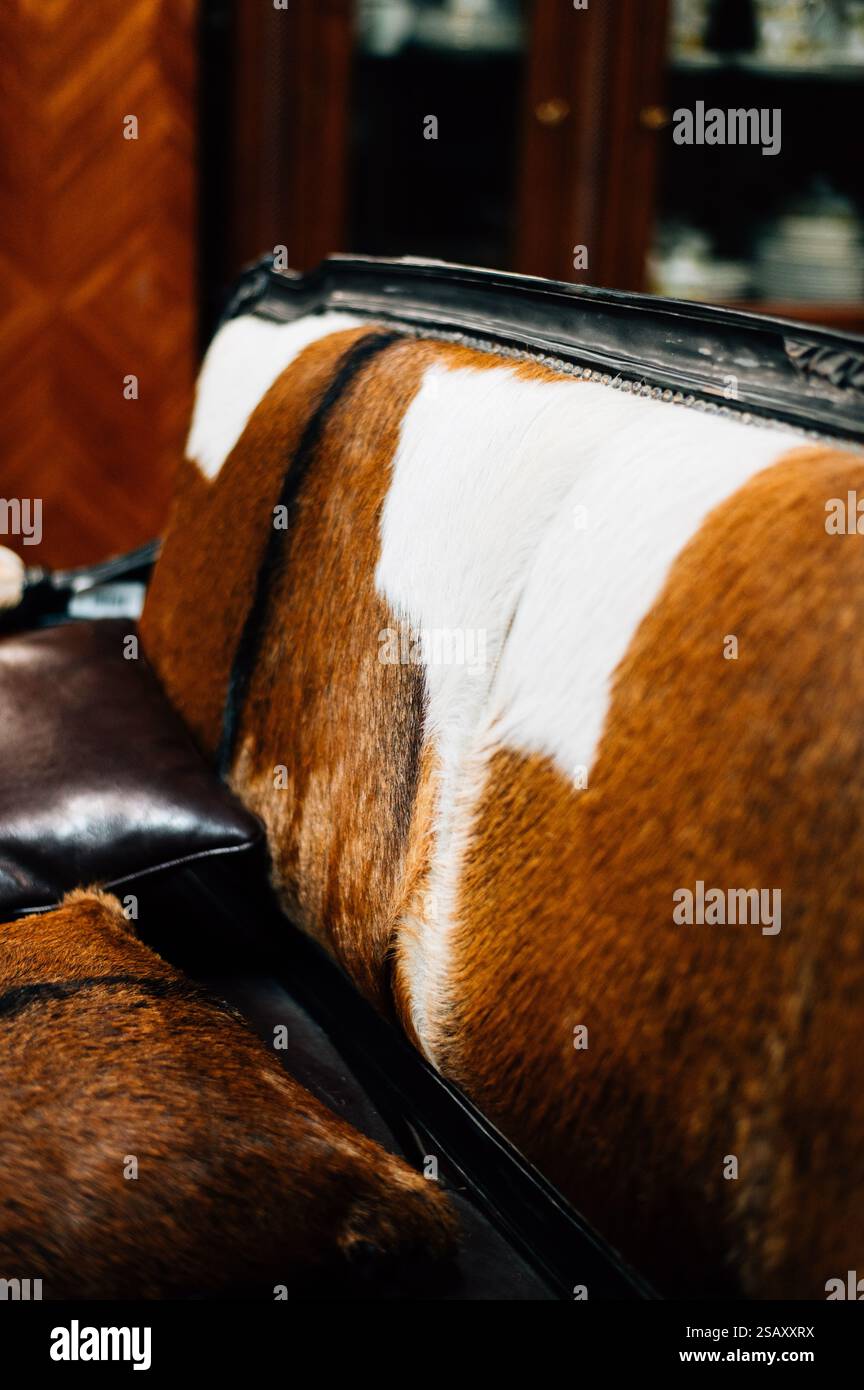 sofa covered with animal skin and fur Stock Photo - Alamy