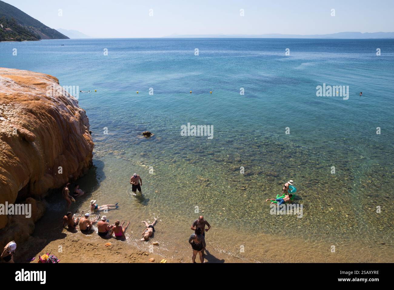 June 25th 2024 - Aidipsos, Greece - The waterfront of Aidipsos, a Greek ...