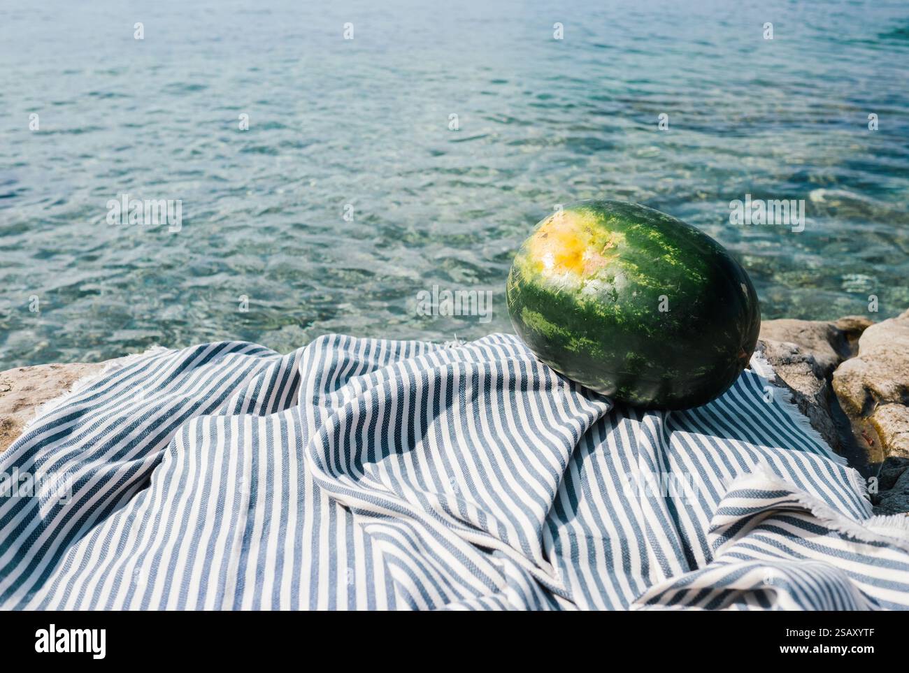 Big juicy watermelon on beach hi-res stock photography and images - Alamy