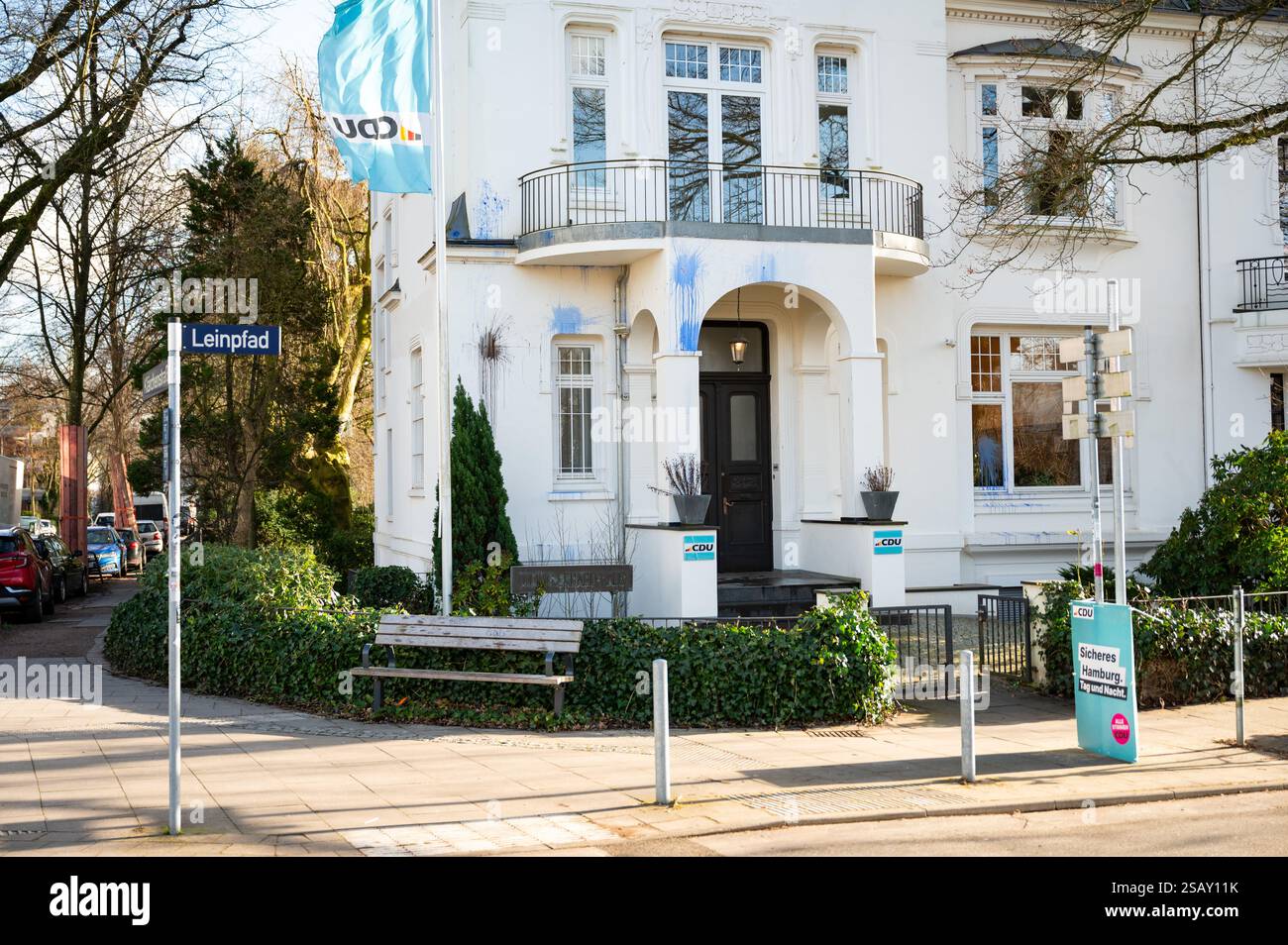31 January 2025, Hamburg: Blue and black paint on the façade of the ...