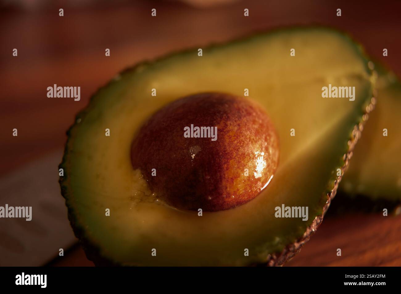 Avocado in stages of being prepared, close up skin textures Stock Photo ...