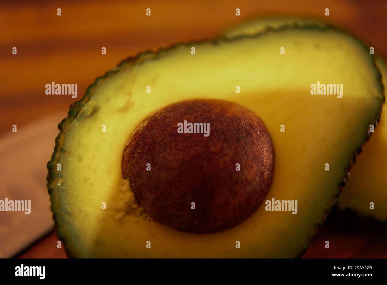 Avocado in stages of being prepared, close up skin textures Stock Photo ...
