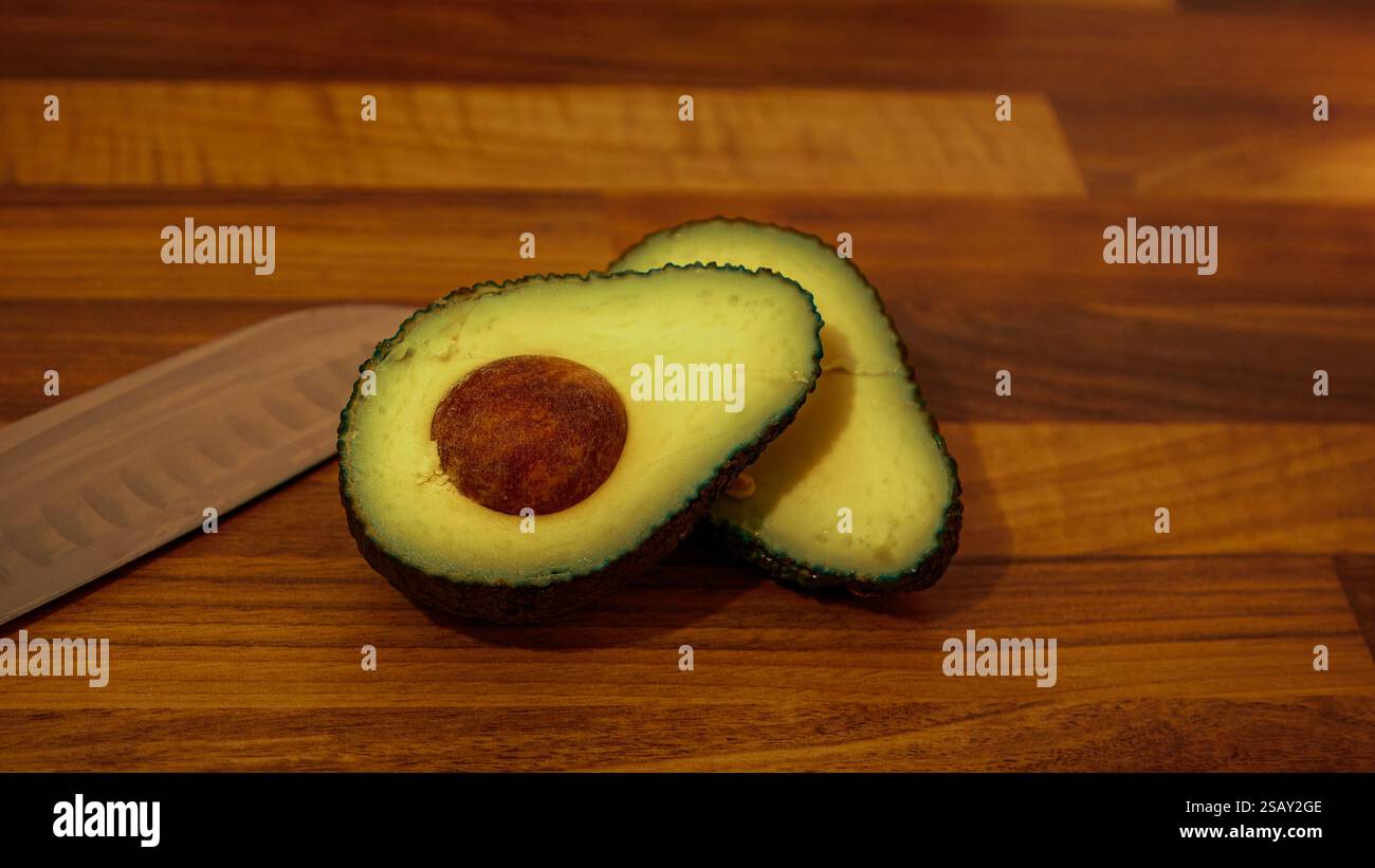 Avocado in stages of being prepared, close up skin textures Stock Photo ...