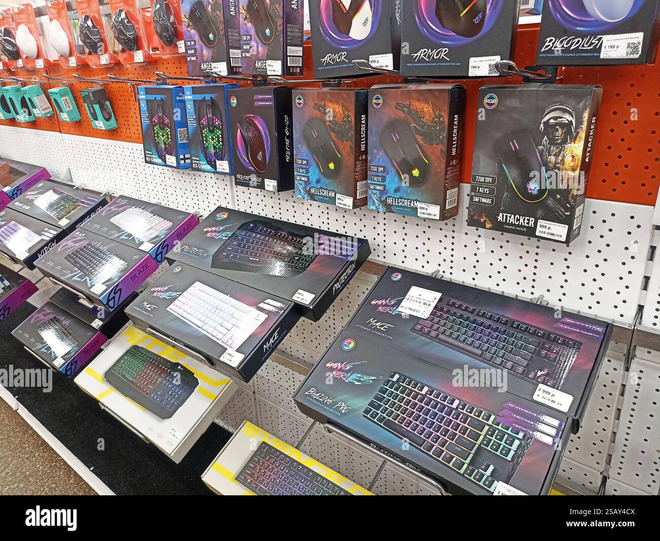 Variety of gaming keyboards and mice on display in a tech store Stock ...