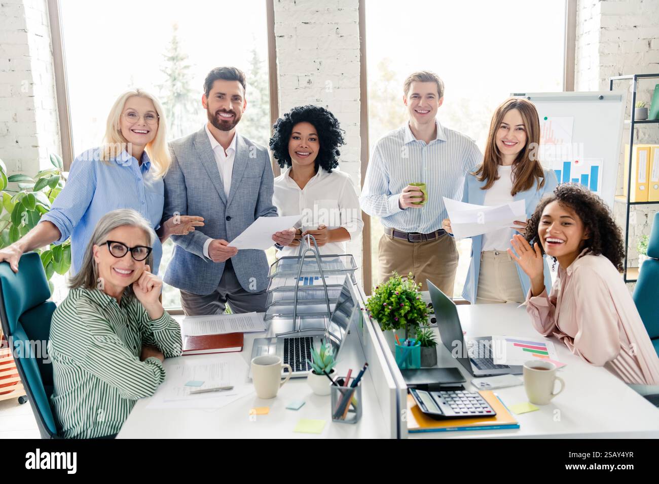 Collaborating office diverse team social hi-res stock photography and ...
