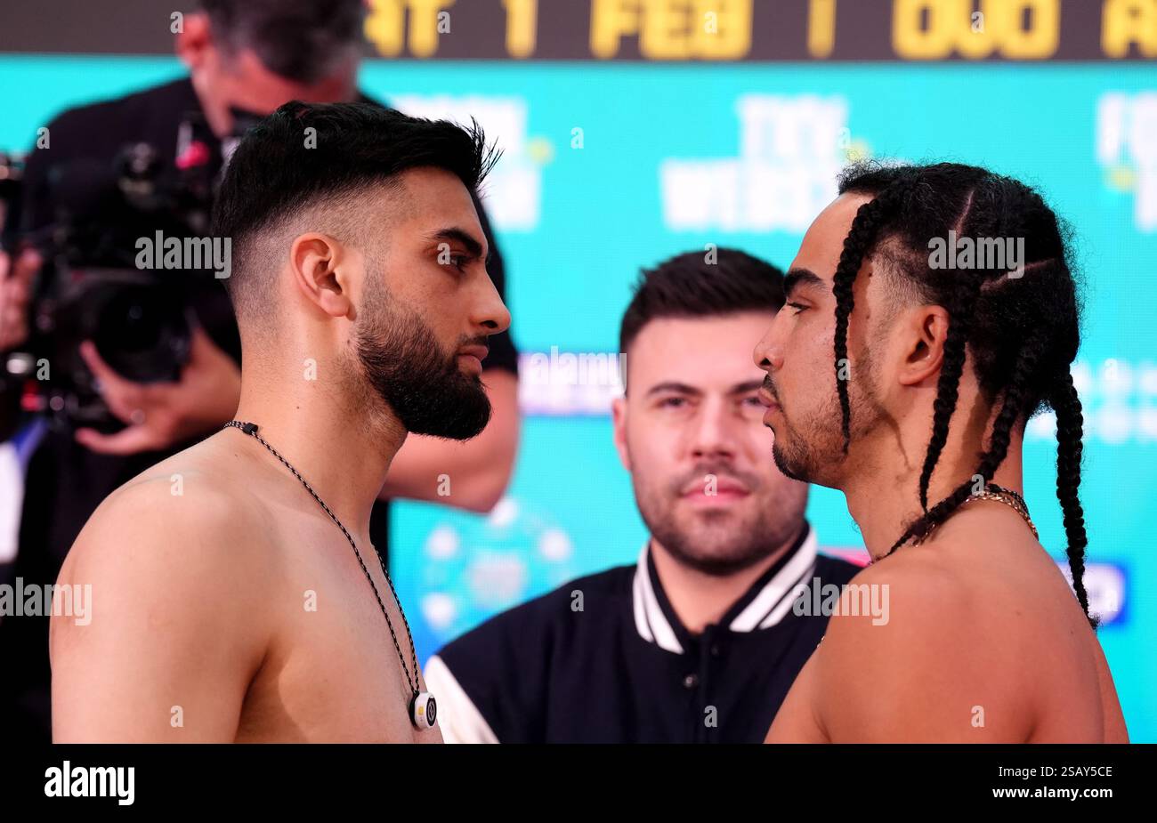 Hassan Azim (left) and Jensen Irving (right) face off following a weigh ...