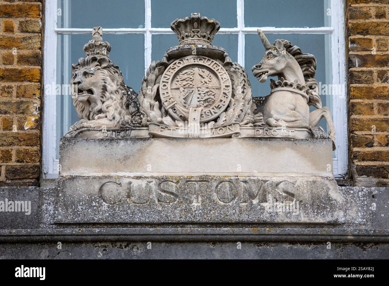 A detail above the entrance to the historic Customs House in the town ...