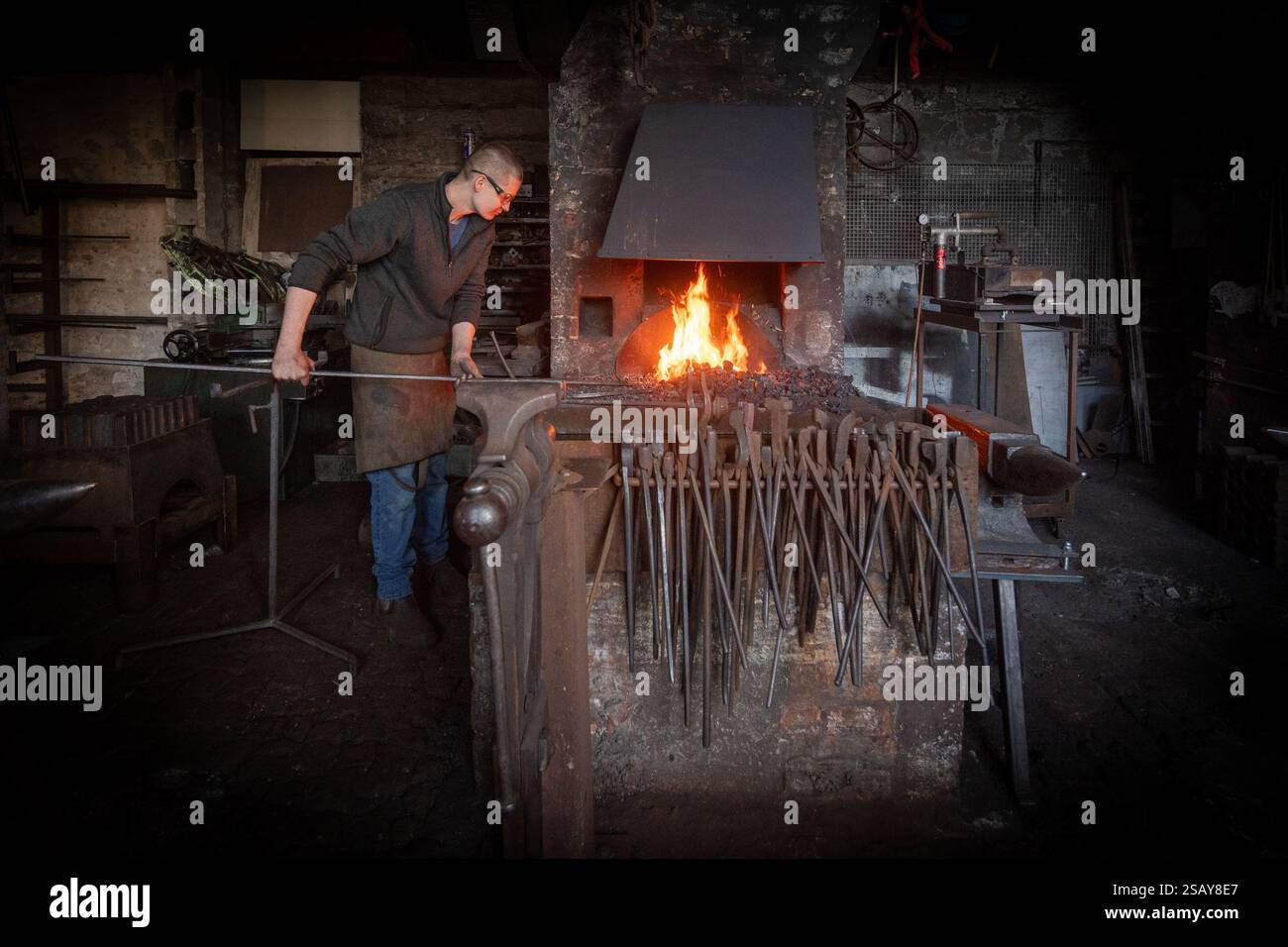 Blacksmiths at work hi-res stock photography and images - Alamy