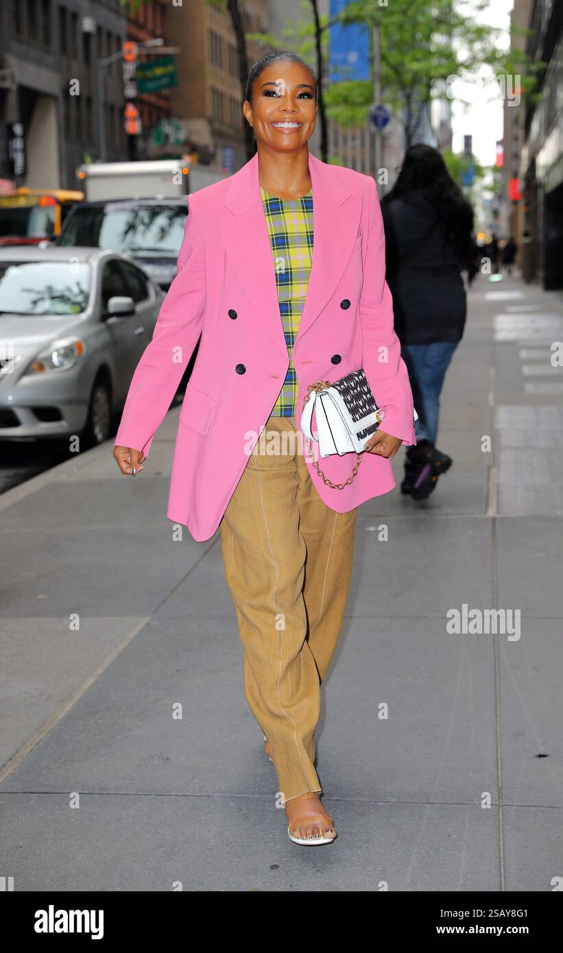 Actress Gabrielle Union wears a pink jacket as she goes out in midtown ...