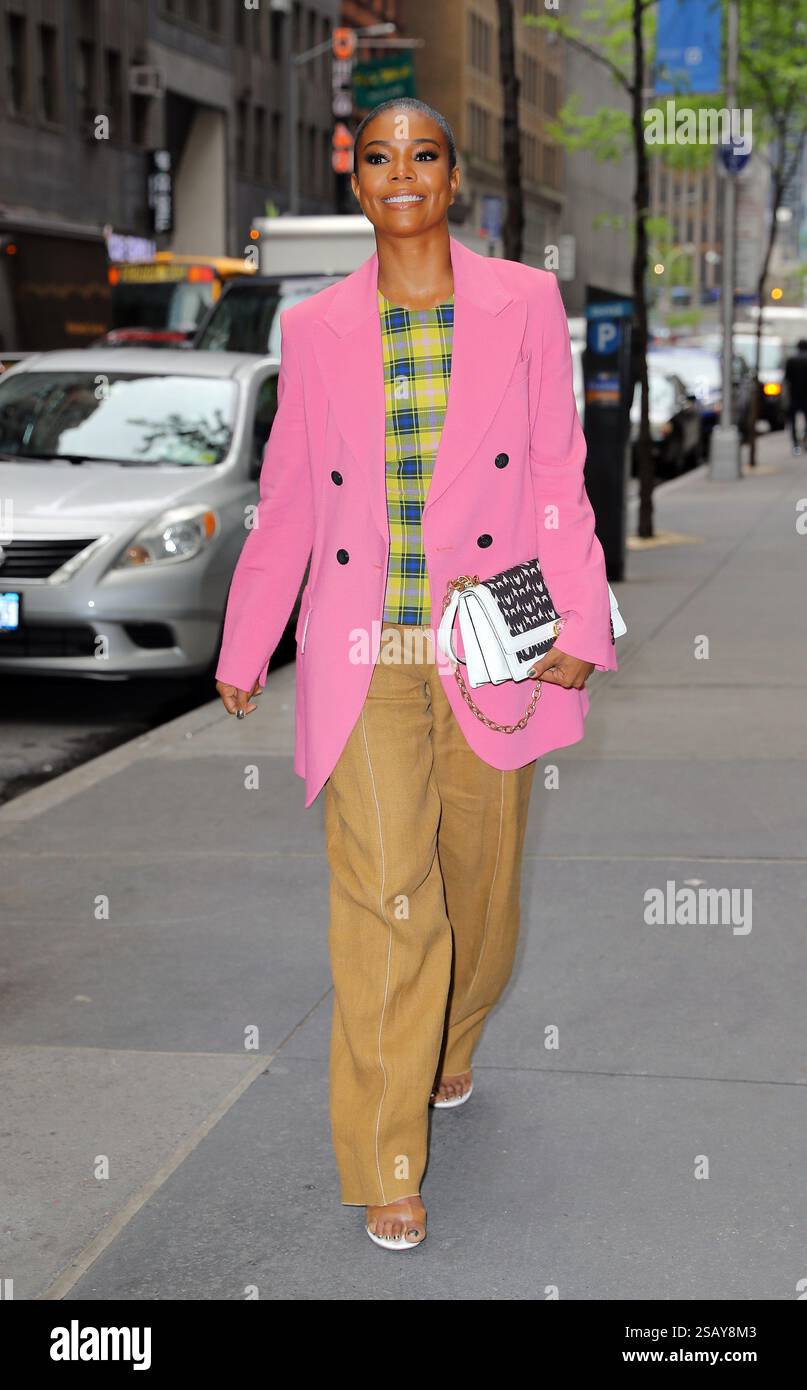 Actress Gabrielle Union wears a pink jacket as she goes out in midtown ...