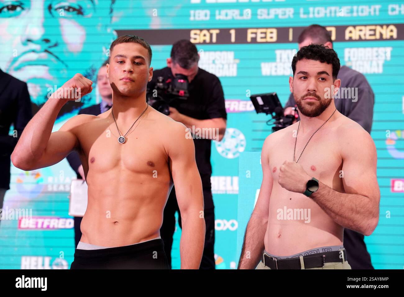 Lucas Roehrig (left) and Milosav Savic (right) following a weigh in ...