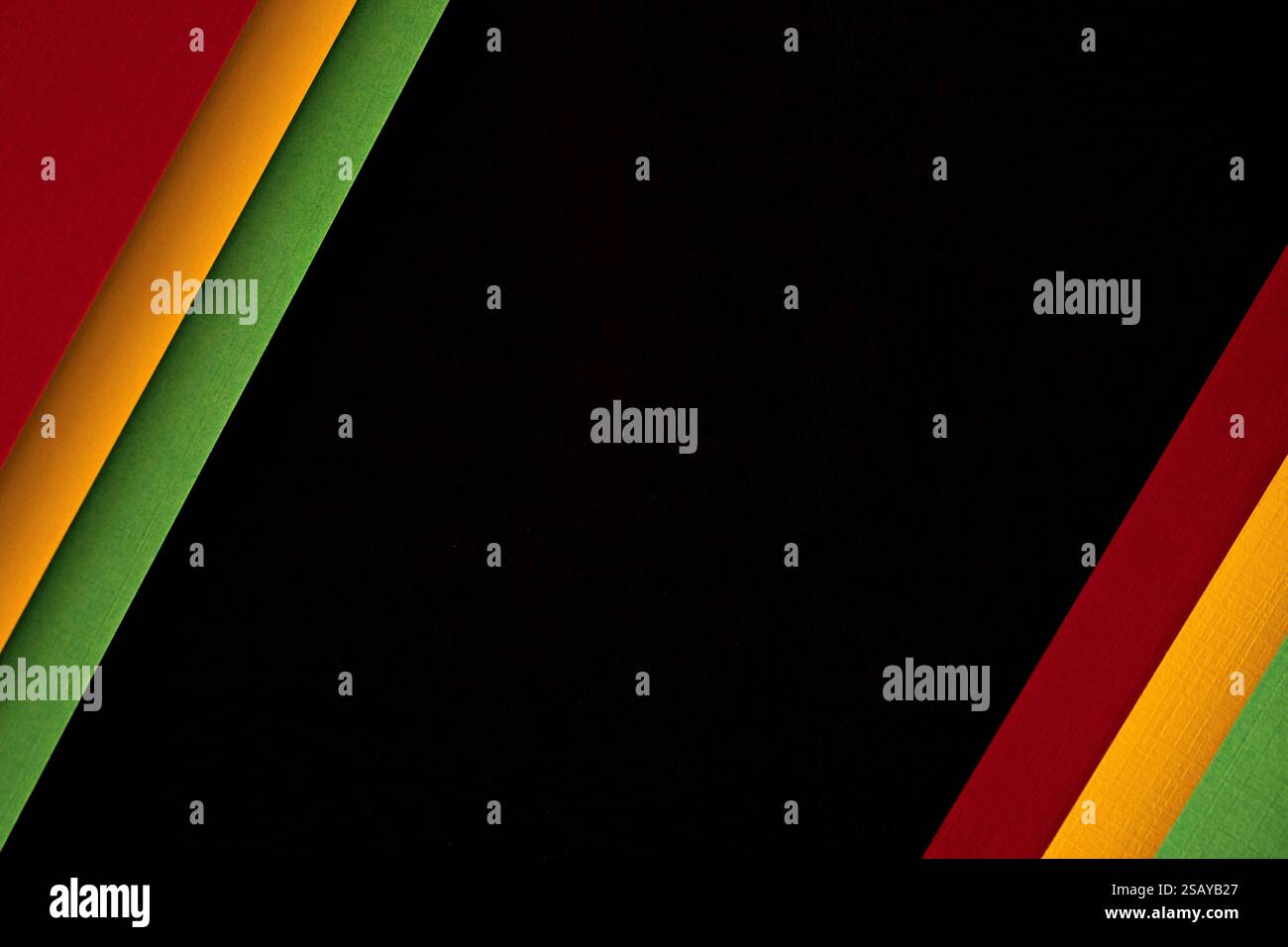 Abstract geometric black, red, yellow, green color paper background ...