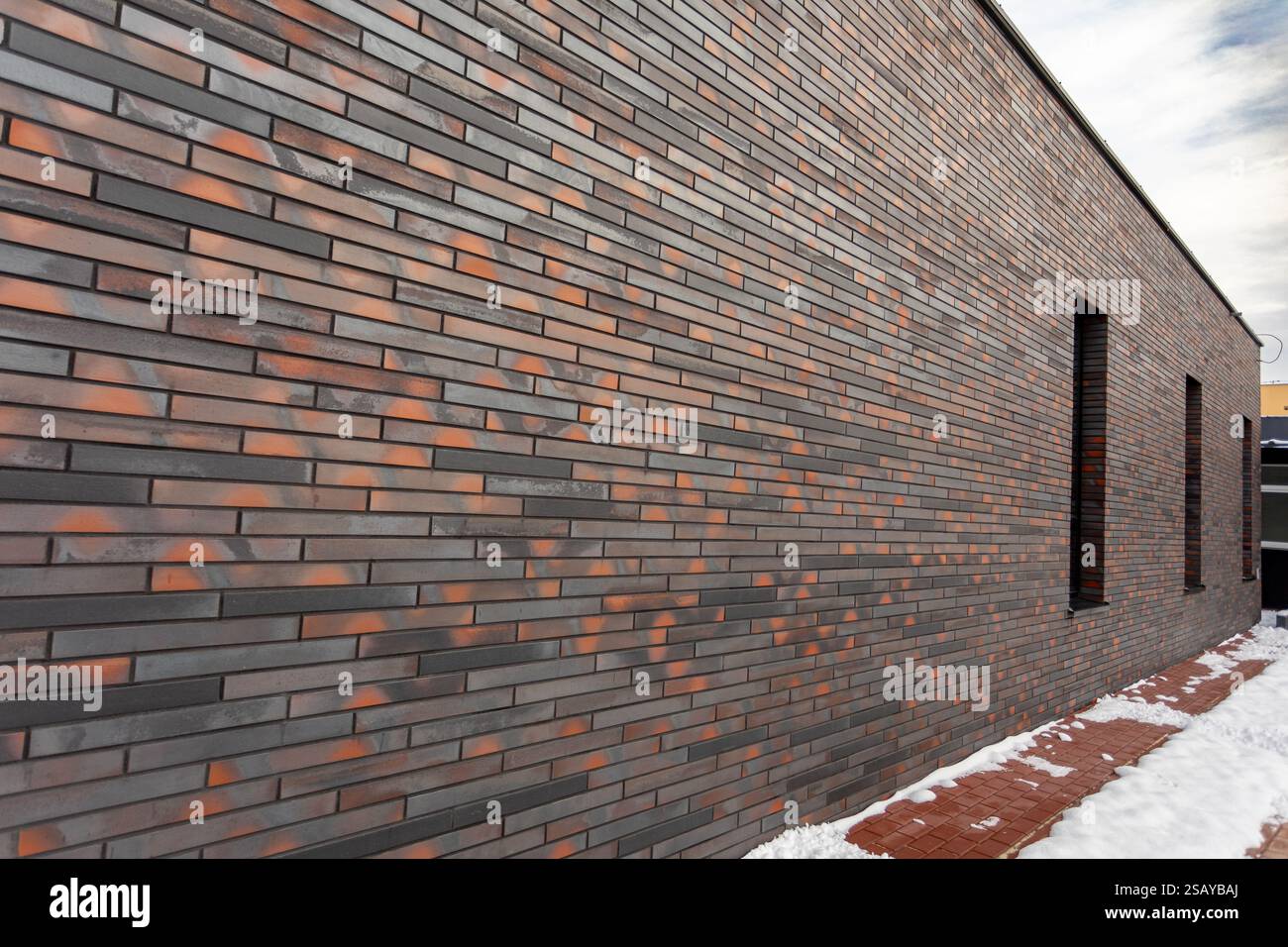 A stunning design of a brick wall with modern, intricate patterns that ...