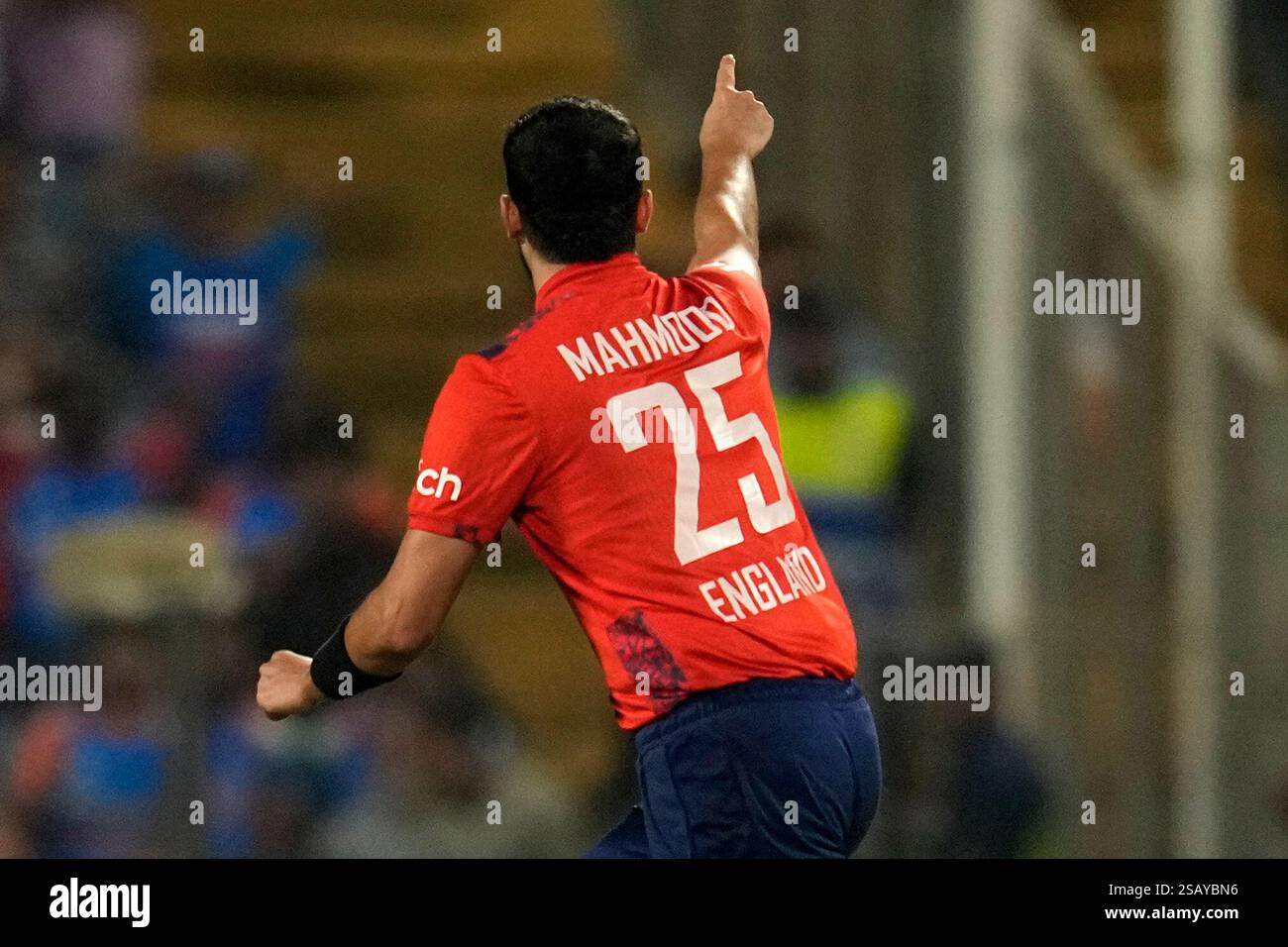 England's Saqib Mahmood celebrates the wicket of India's Tilak Varma ...
