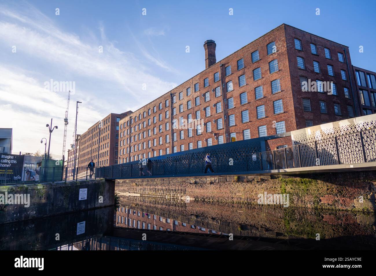 View of traditional warehouse buildings in the New Islington Marina, a ...