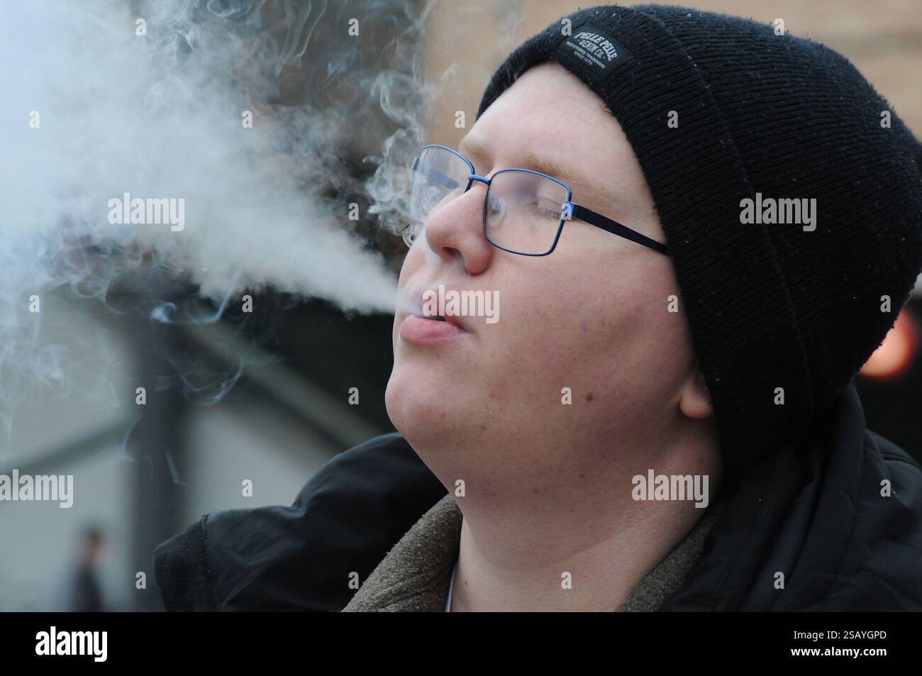 Copenhagen/ DenmarK/31 JANUARY 2025/ person smokes e-cigarette in ...