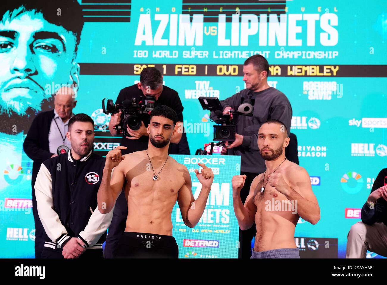 Adam Azim (left) and Sergey Lipinets (right) following a weigh in ...