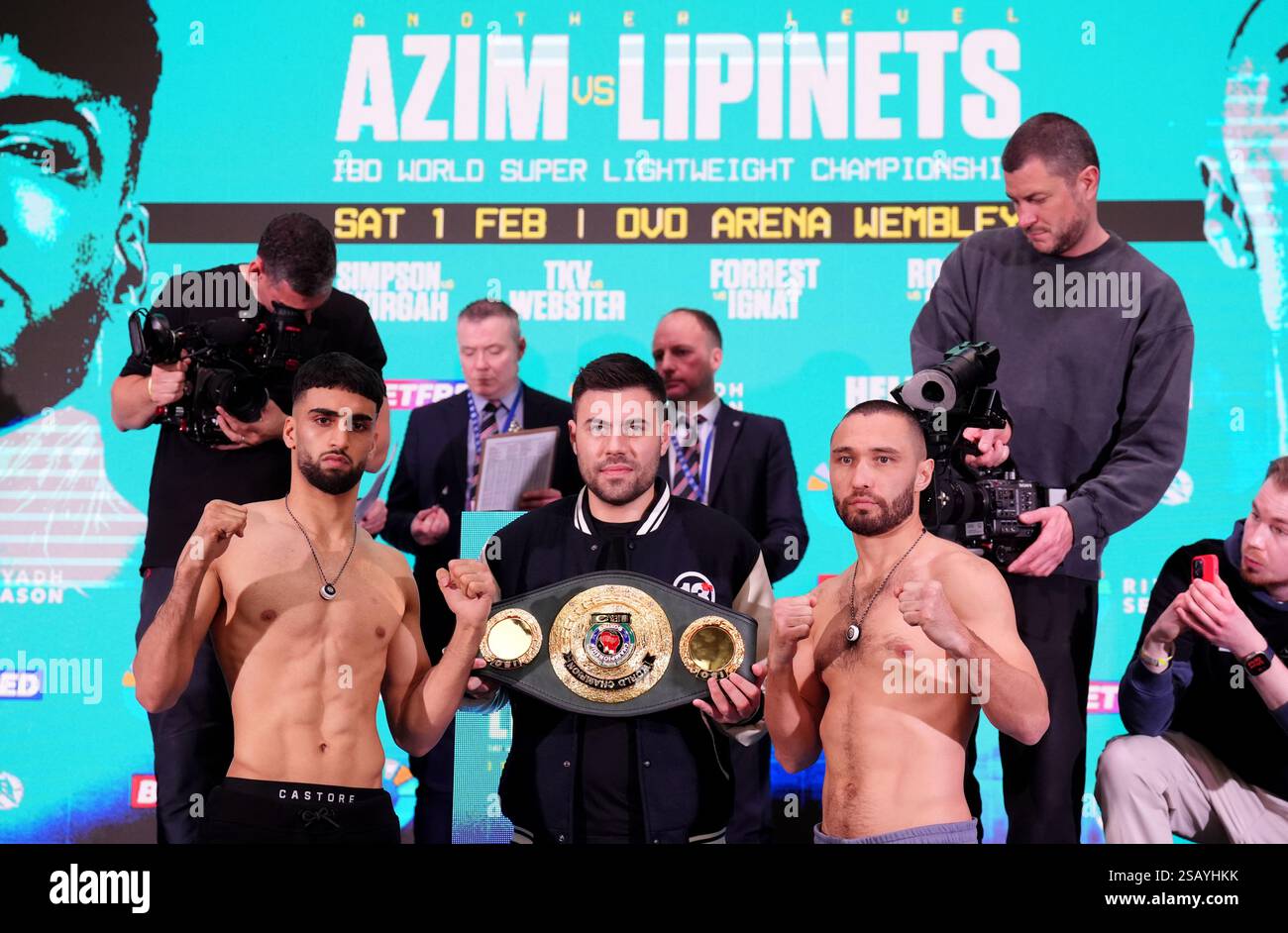 Adam Azim (left) and Sergey Lipinets (right) following a weigh in ...
