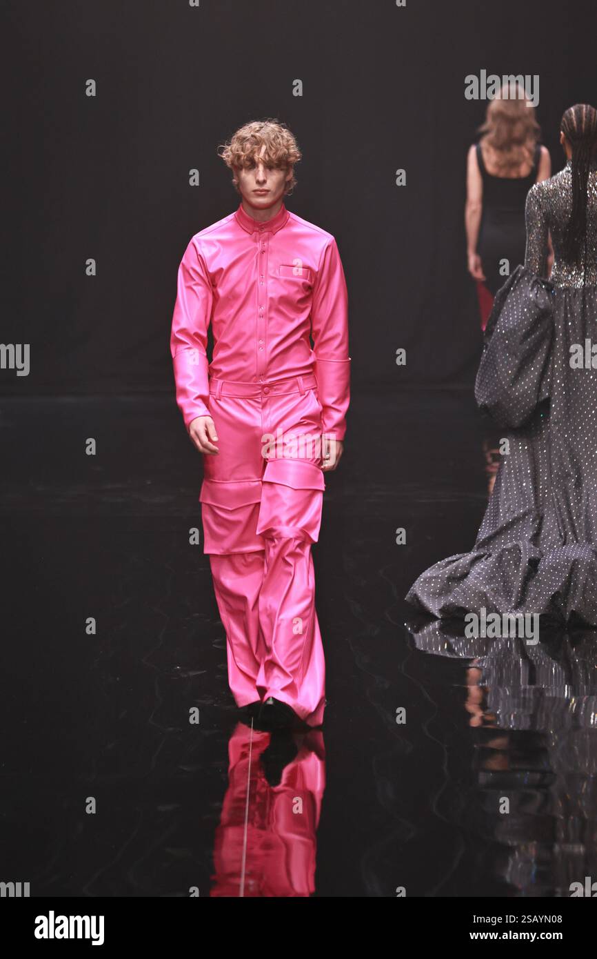 BERLIN, GERMANY - January 31: A model walks the runway during the ...