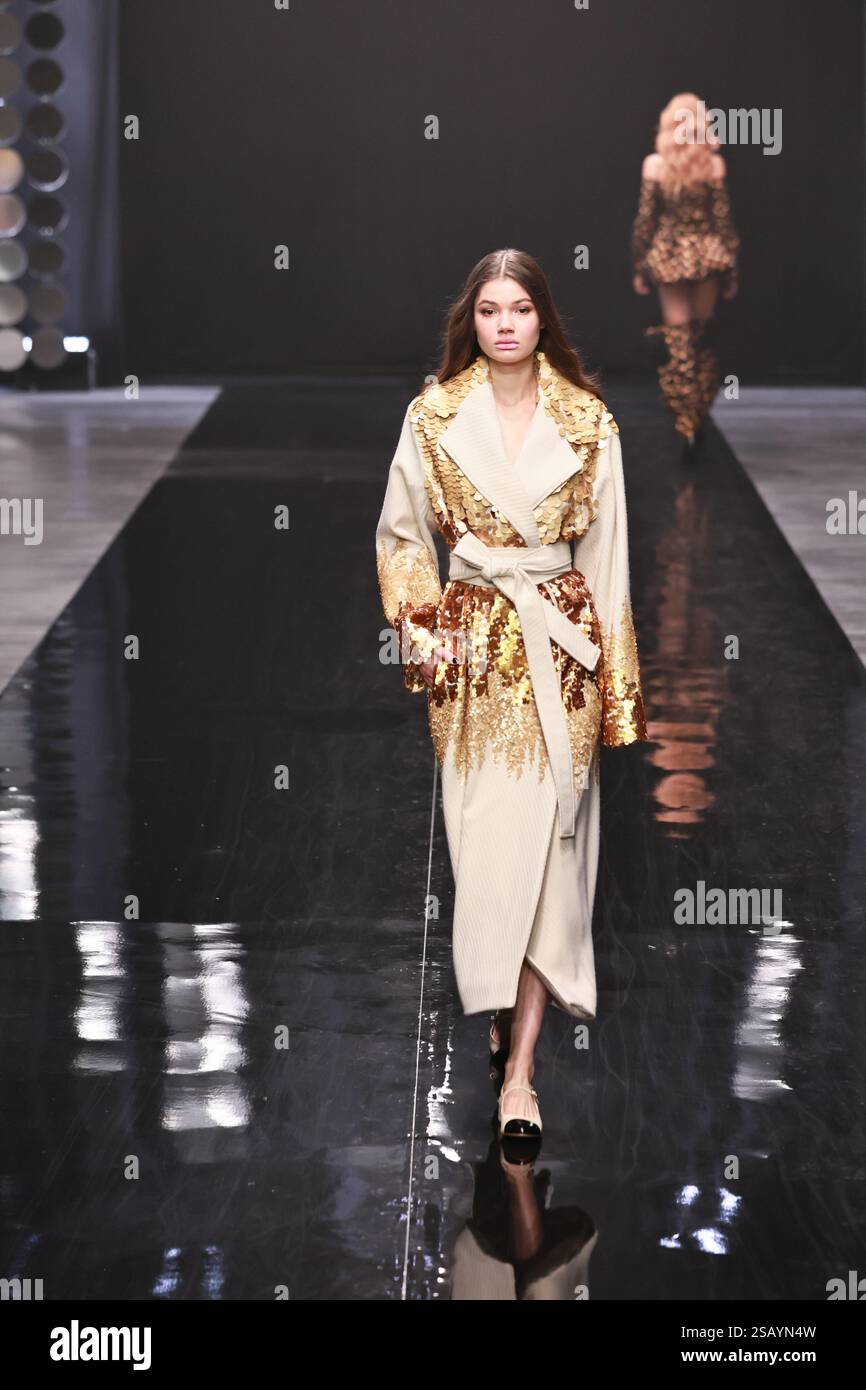 BERLIN, GERMANY - January 31: A model walks the runway during the ...