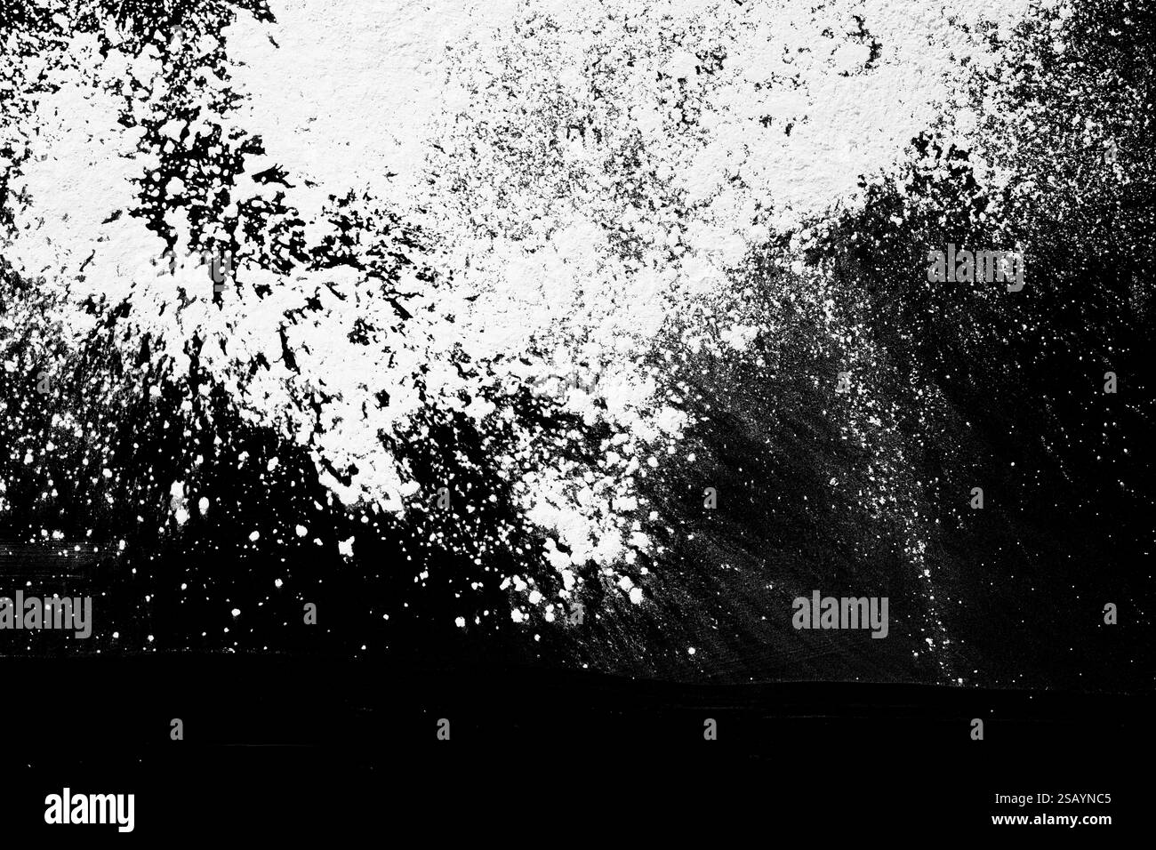 Detail of a fine white Holi flour powder granules dust cocaine drug ...